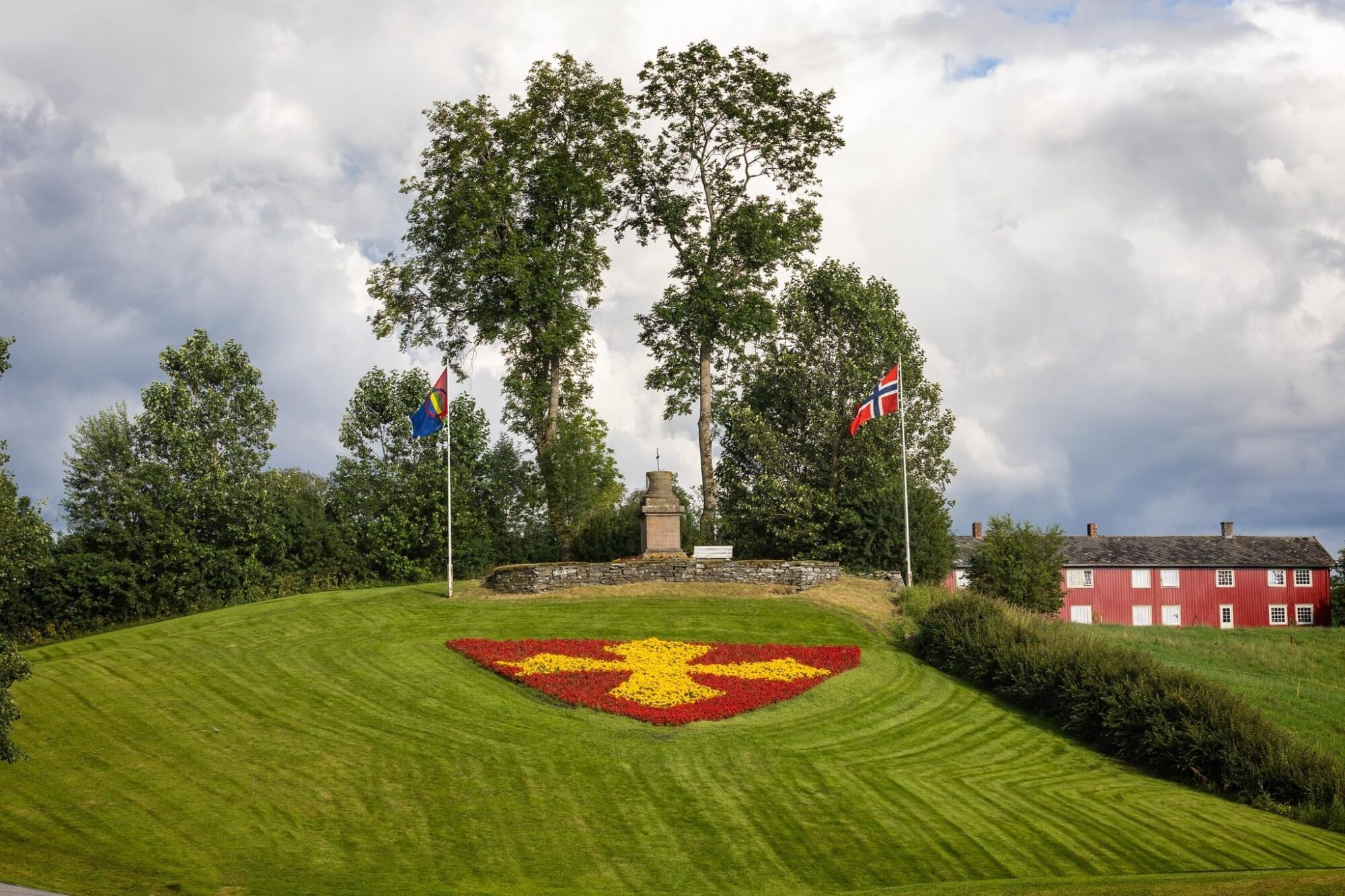 Sami and Norwegian flags on Olavshaugen during the Olsok days ...